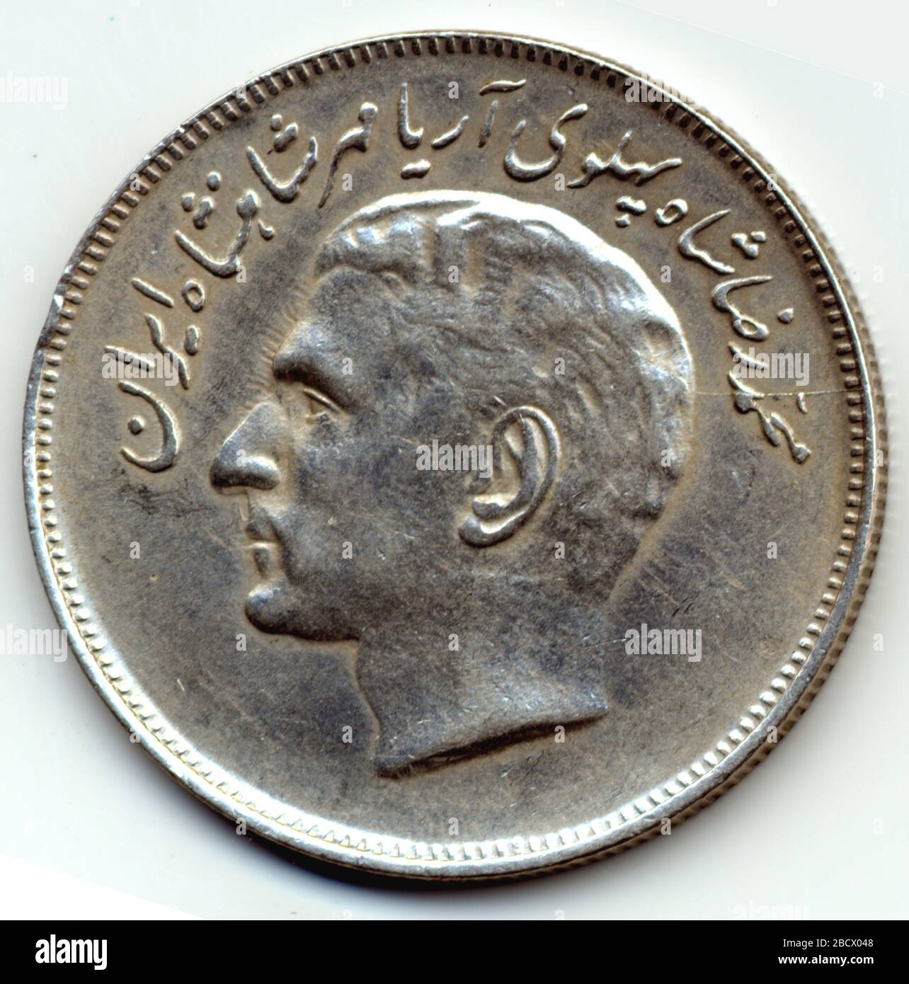 Iranian coin hi-res stock photography and images - Alamy