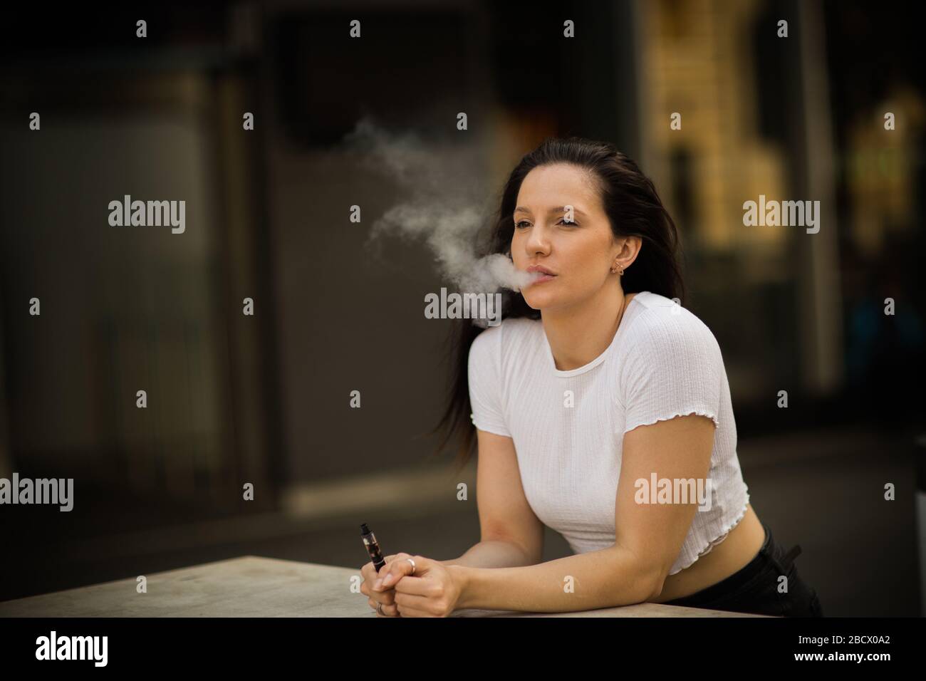 Young lady vaping hi-res stock photography and images - Alamy