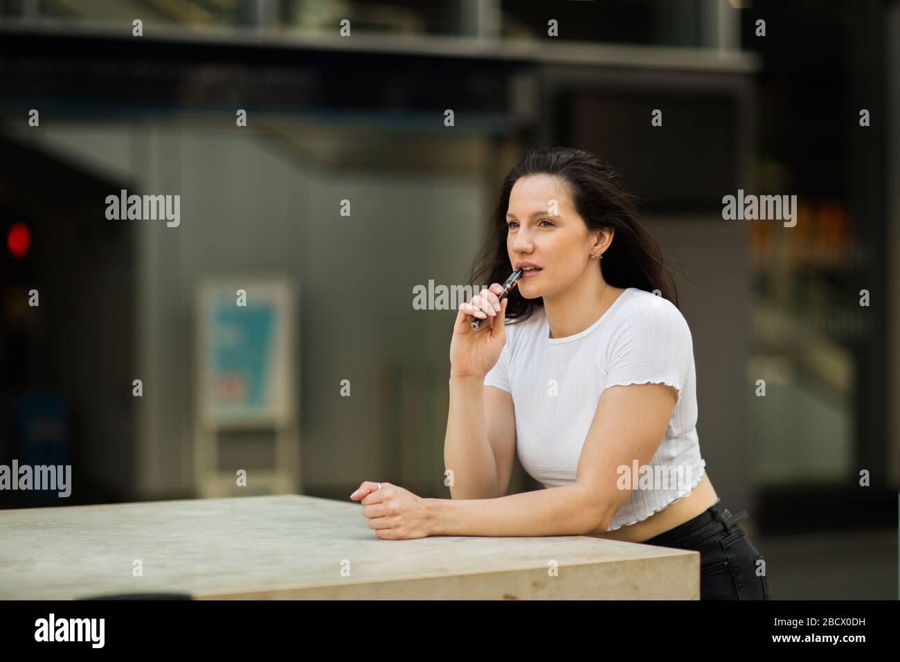 Young lady vaping hi-res stock photography and images - Alamy