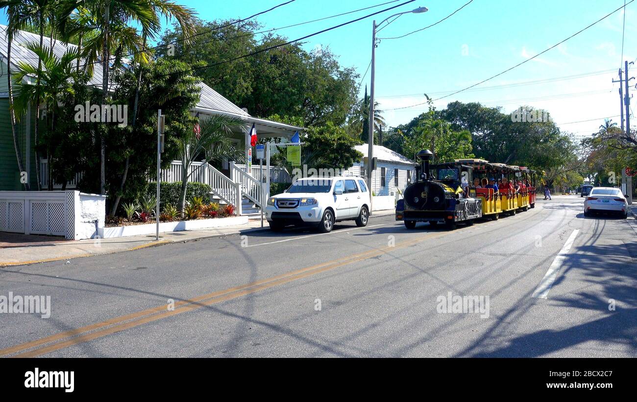 The famous Conch Train driving through Key West - KEY WEST, USA - APRIL ...