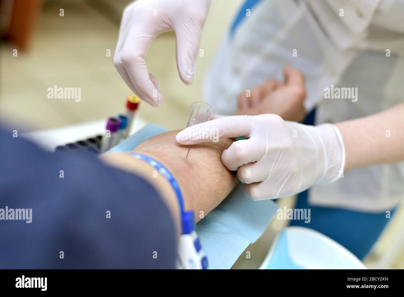 Taking venous blood from a patient in a medical laboratory. The step of ...