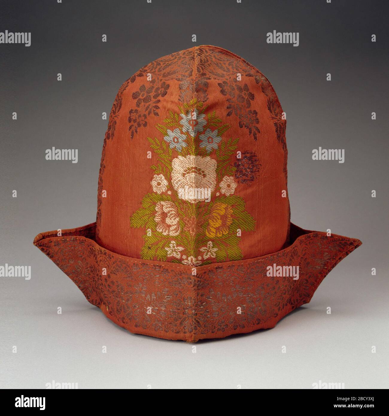 Nightcap. Tall man's nightcap with deep bicorne cuff in salmon-colored ...