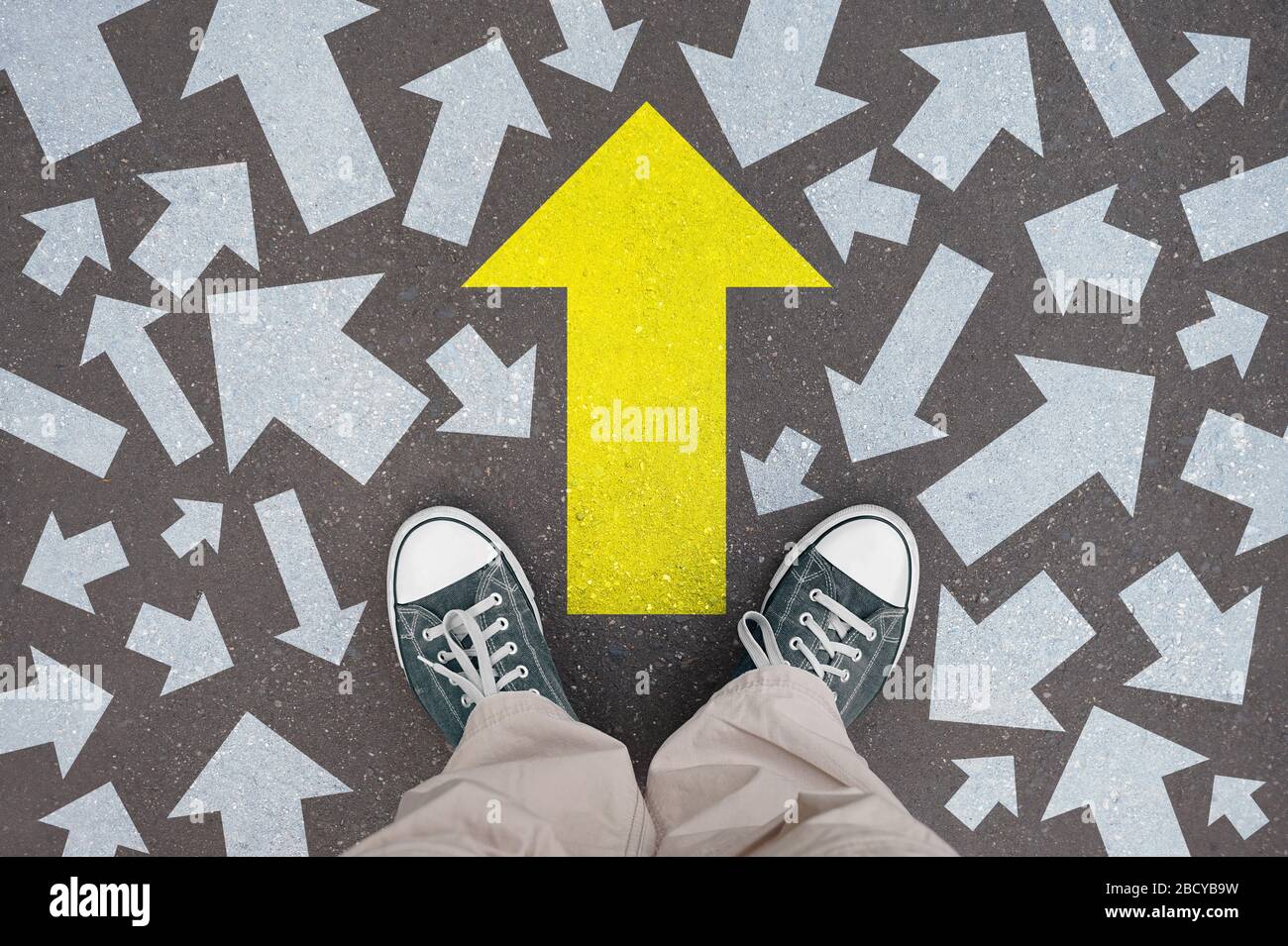 Shoes, trainers - forward arrow Stock Photo - Alamy