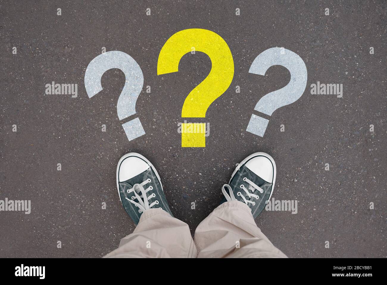 Shoes, trainers - question marks Stock Photo - Alamy