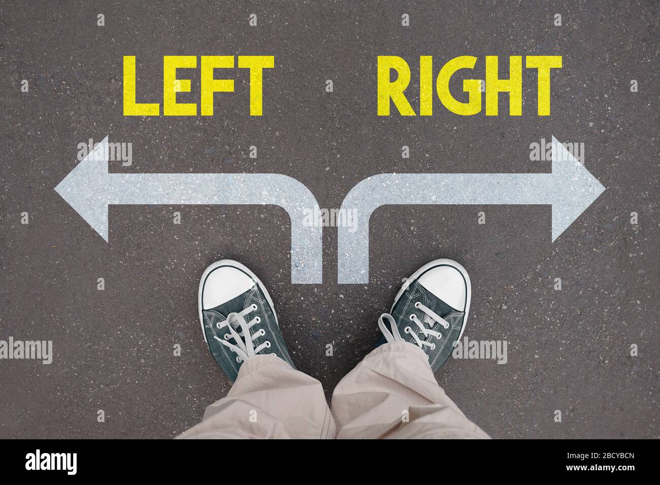 Shoes, trainers - right and left concept Stock Photo - Alamy