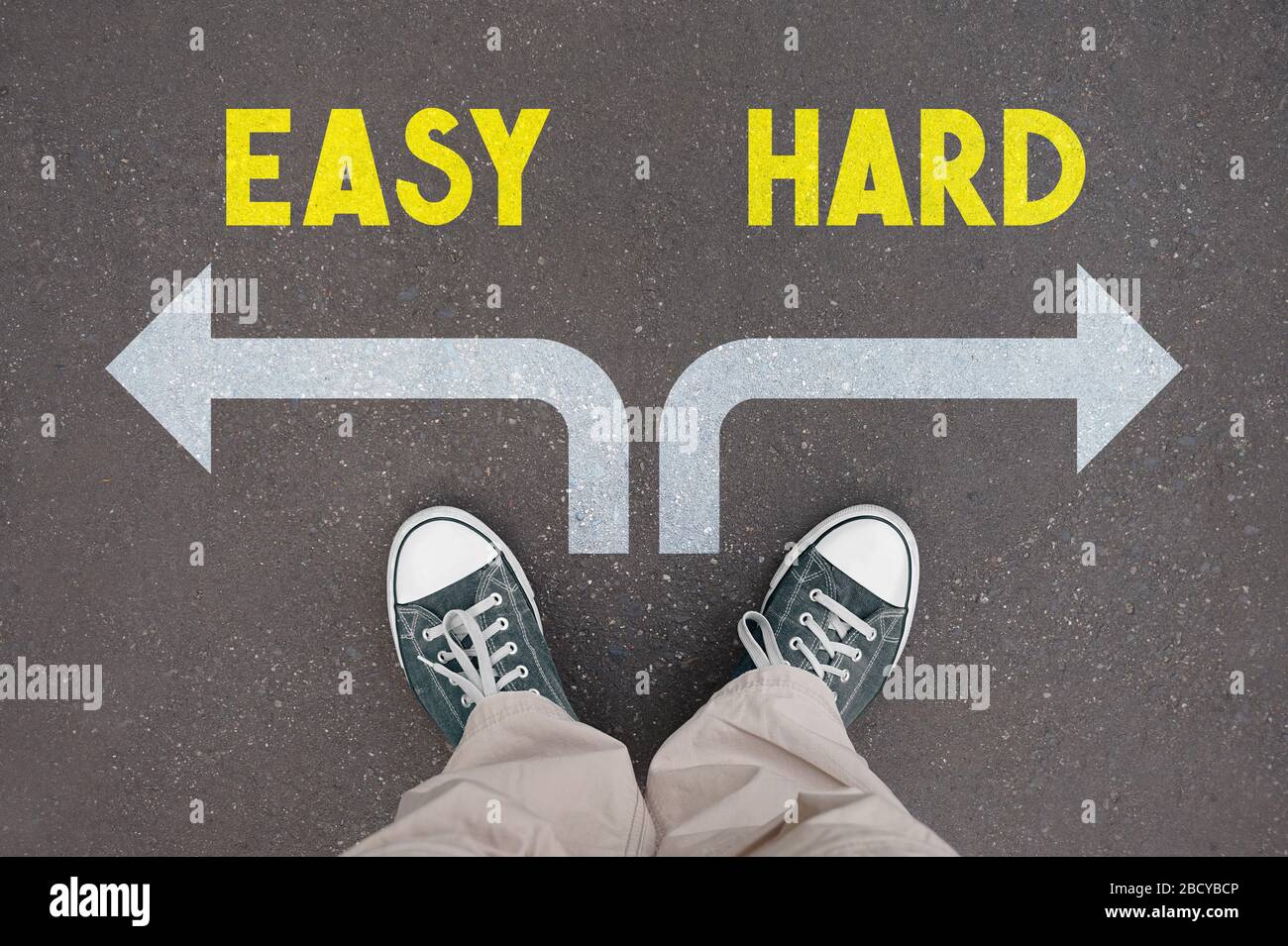 Shoes, trainers - easy and hard concept Stock Photo - Alamy