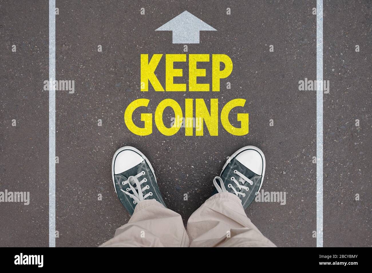 Shoes, trainers - keep going Stock Photo - Alamy