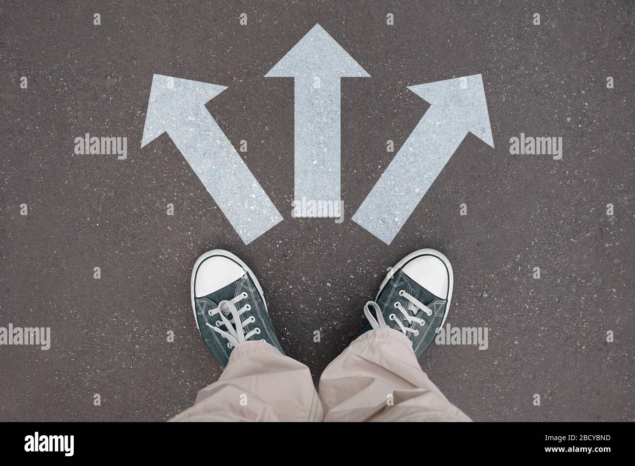 Shoes, trainers - three arrows Stock Photo - Alamy