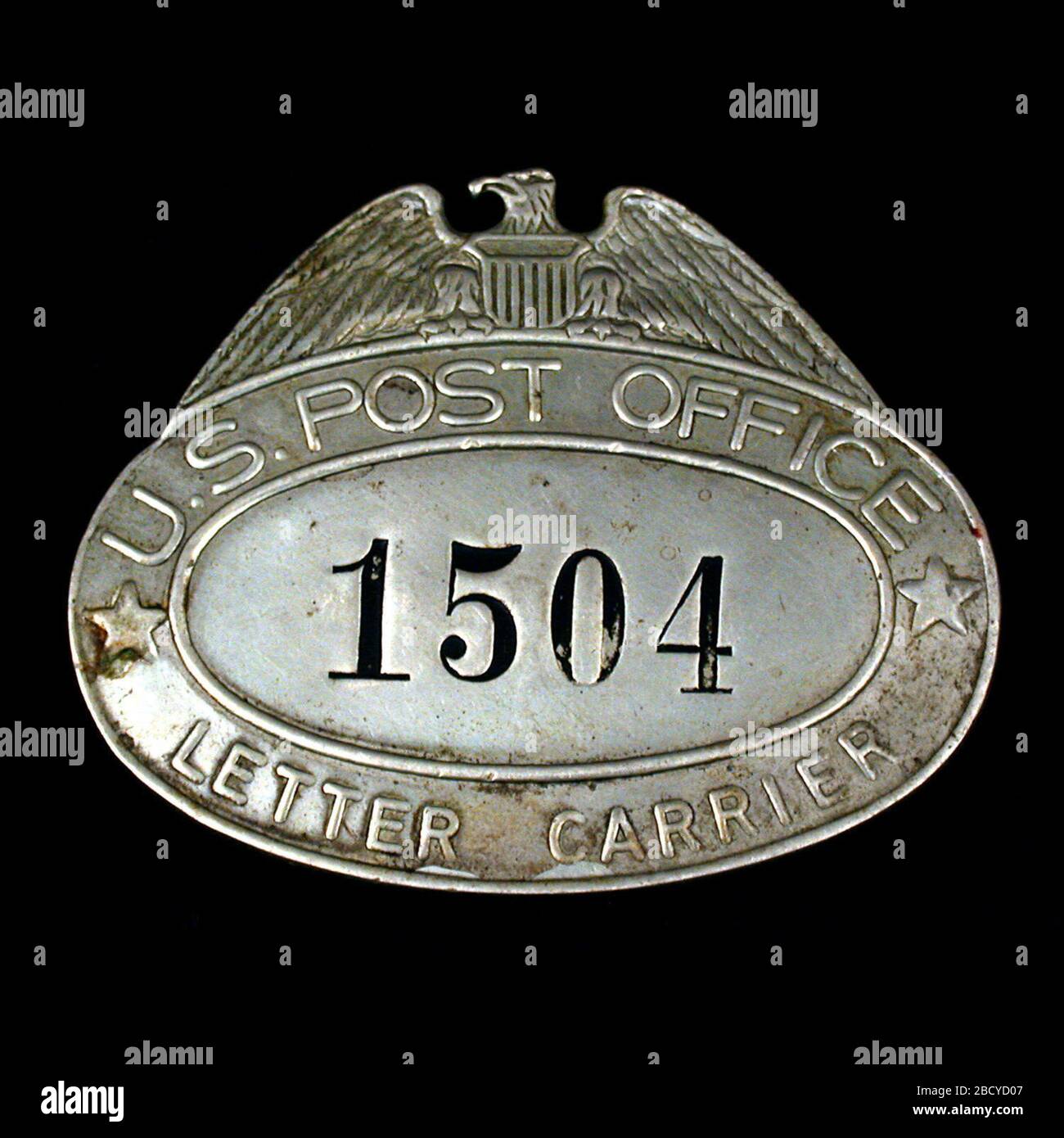 City letter carrier cap badge number 1504. U.S. Post Office Department ...