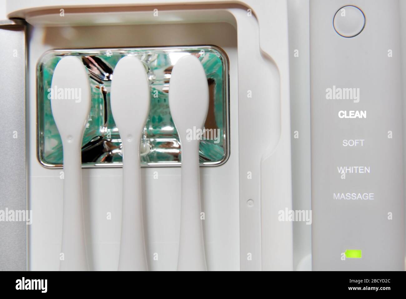 An electric toothbrush with replaceable attachments of tooth brush ...