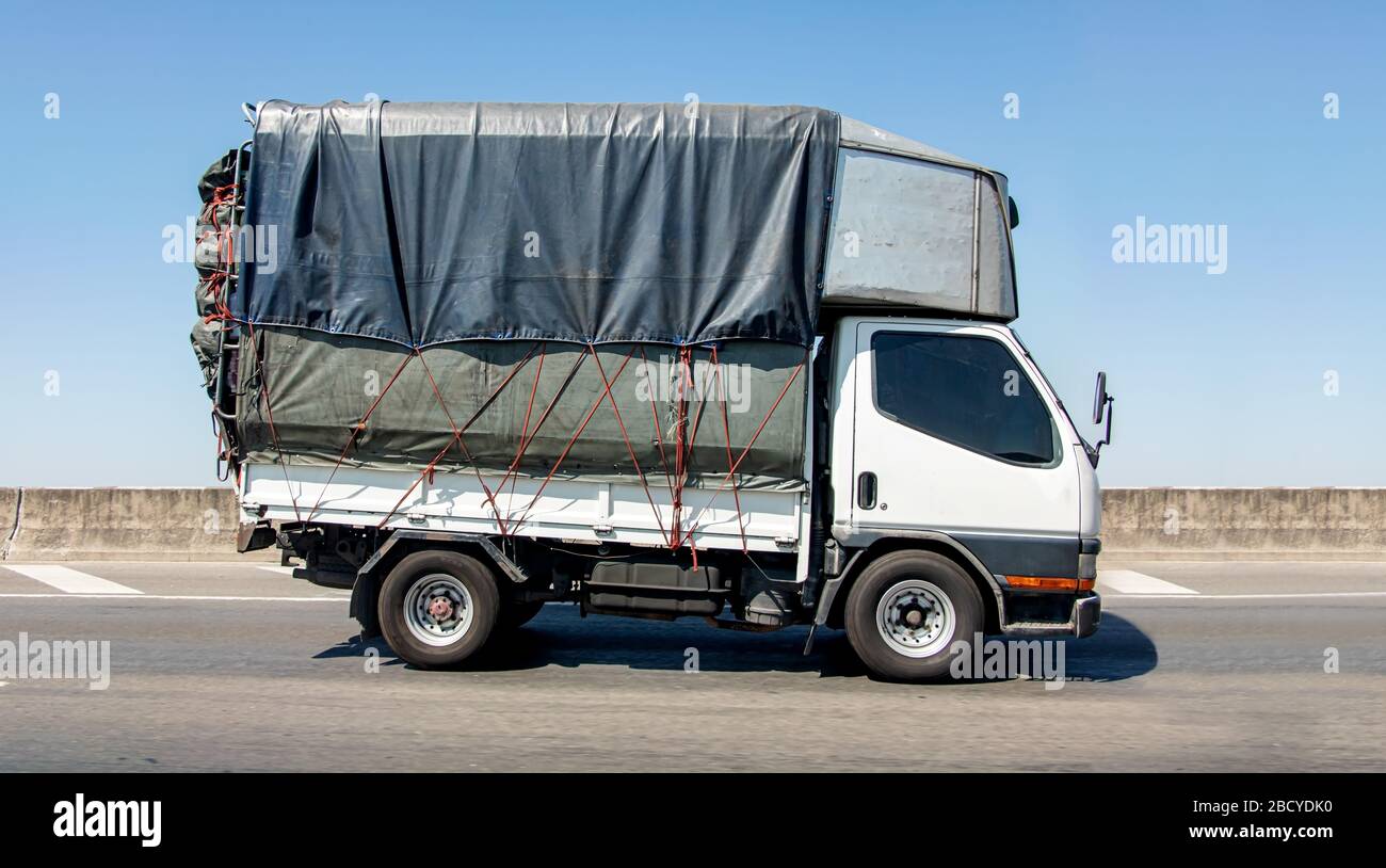 A fully loaded lorry is ride on the highway Stock Photo - Alamy