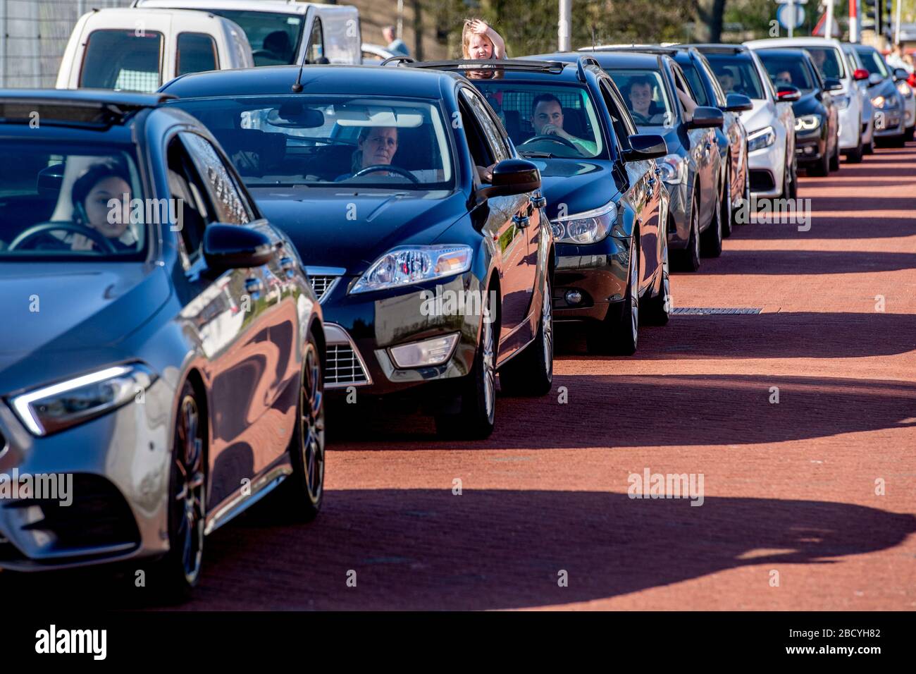 Vehicles in queue hi-res stock photography and images - Alamy