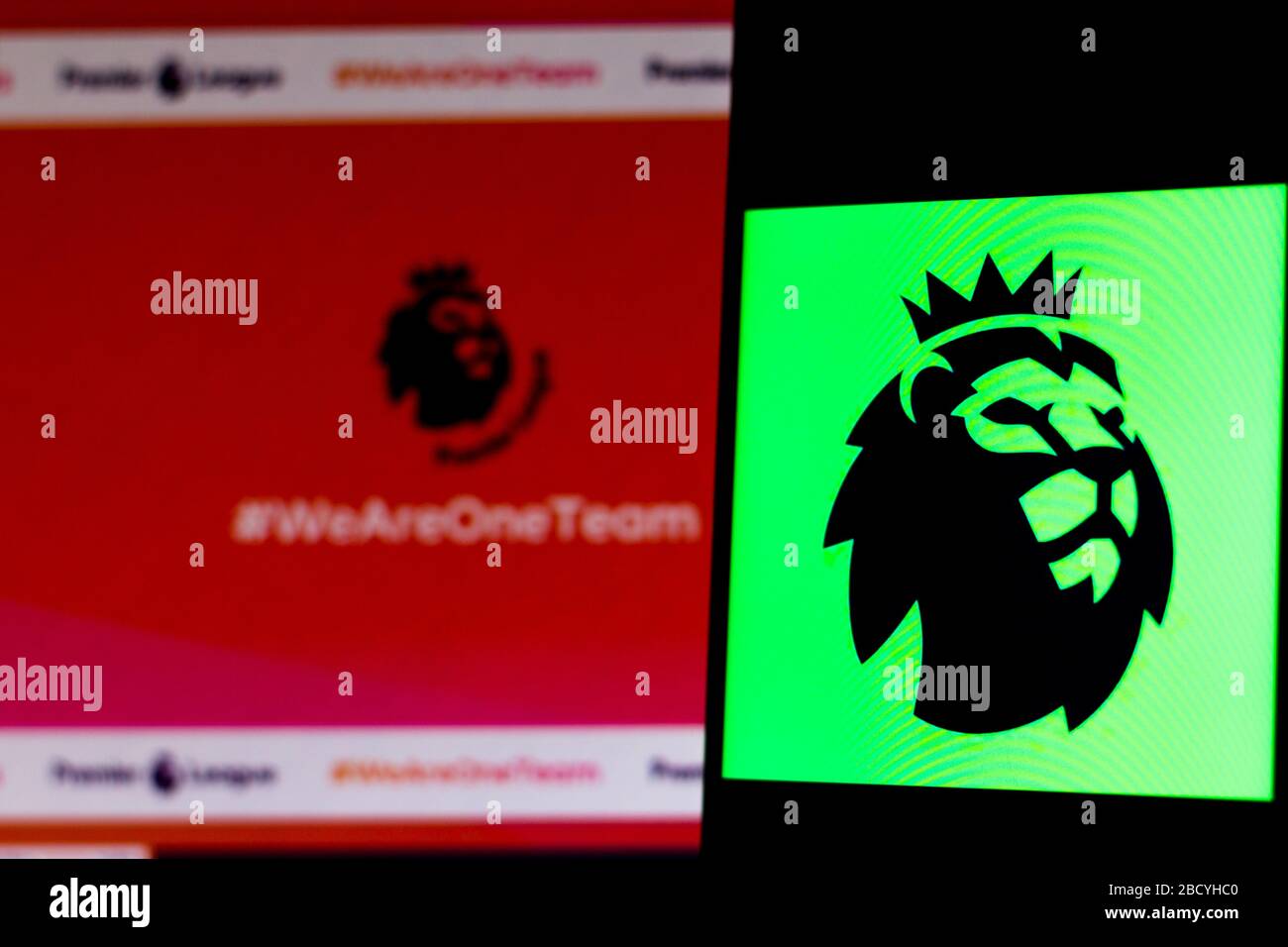 In this photo illustration a Premier League logo seen displayed on a ...