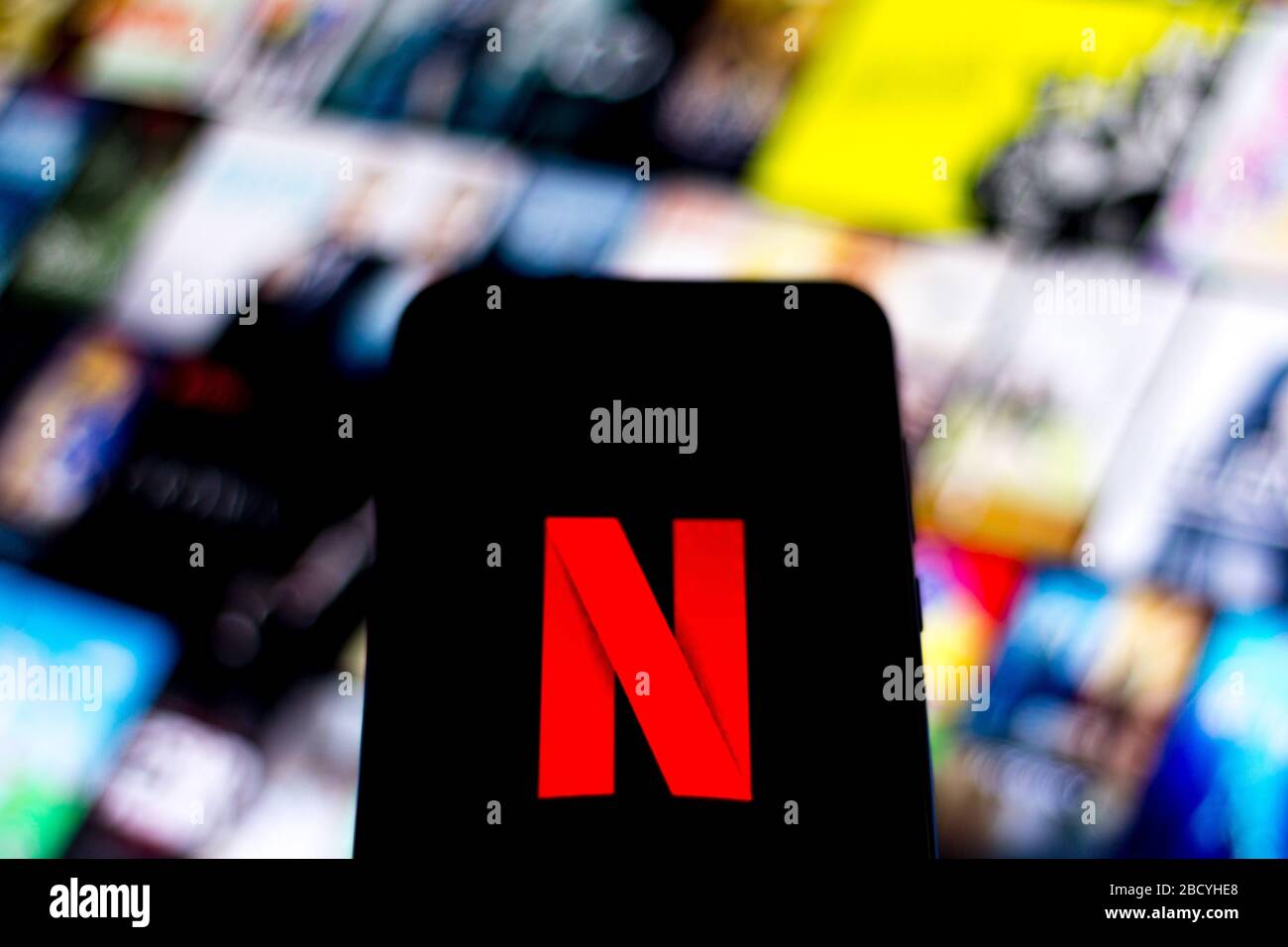 In this photo illustration a Netflix logo seen displayed on a ...