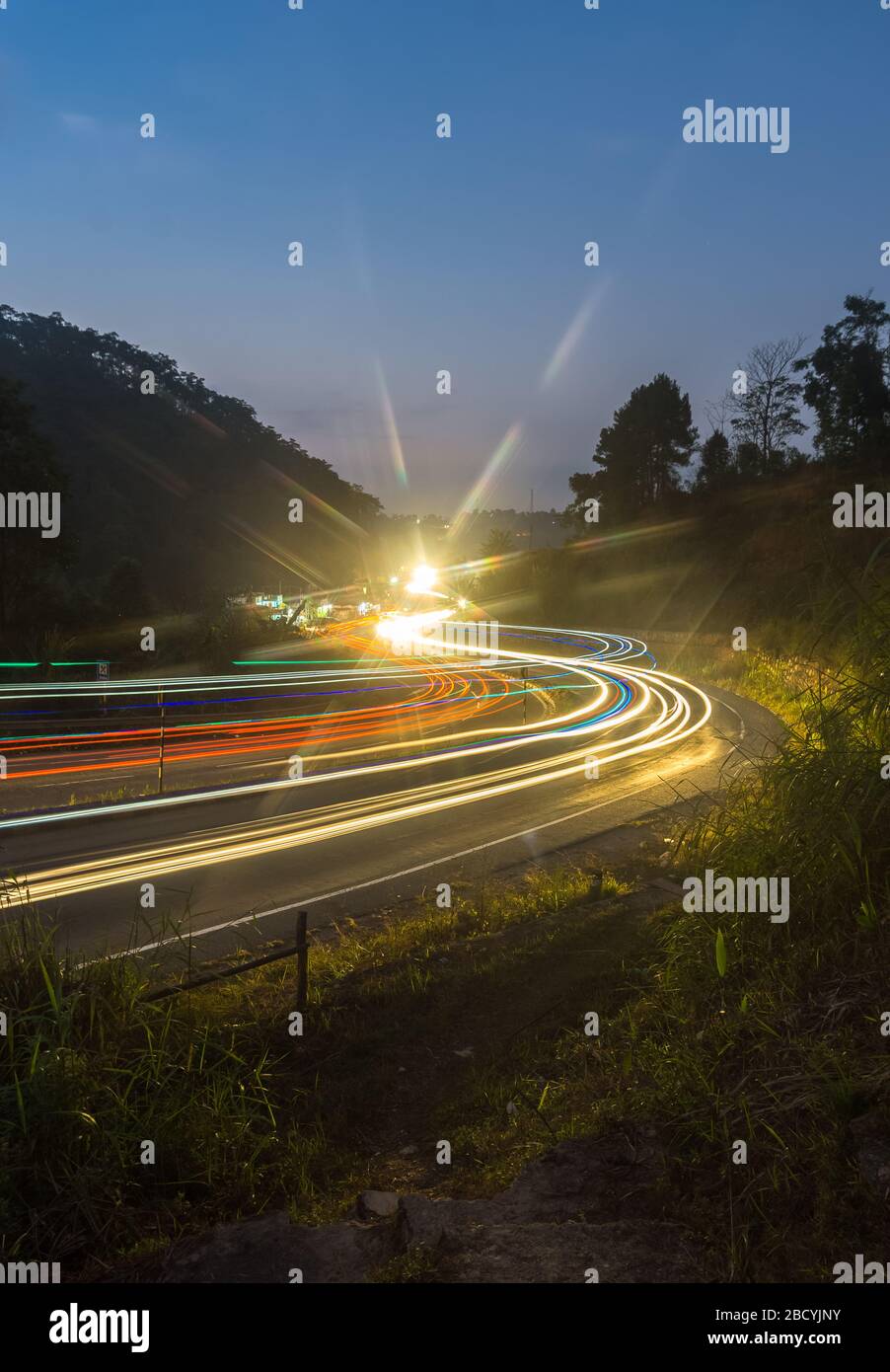 highway rails of vehicles lights during rush hour and sunset Stock ...