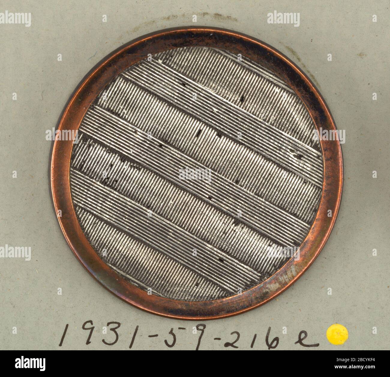 Button. Research in ProgressA) Copper center with pierced and engraved ...