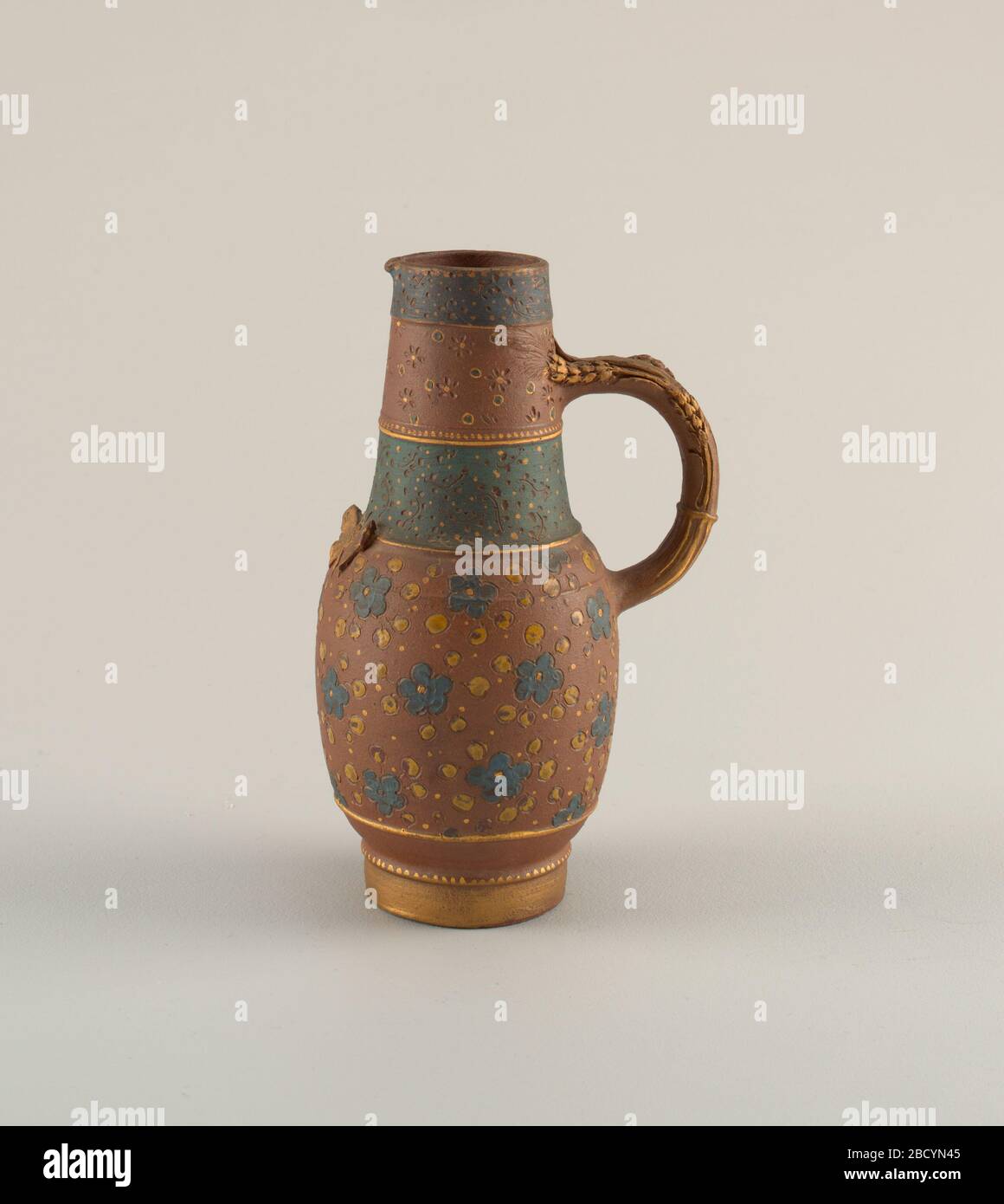 Pitcher. Research in ProgressGlobular body on foot. Tall neck with thin ...