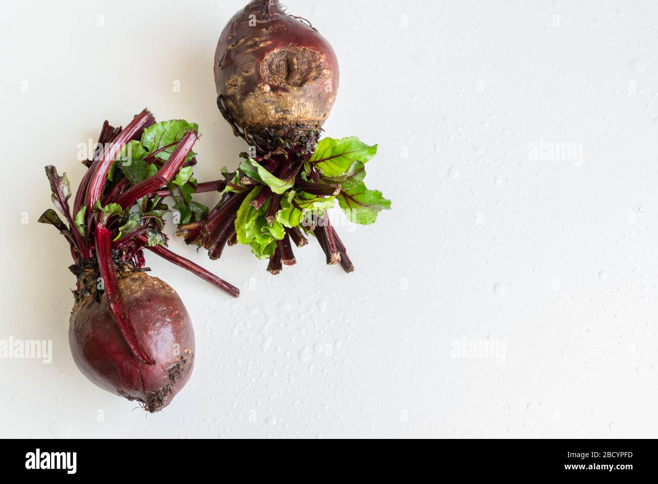 Isolated raw beet root on white background Stock Photo - Alamy