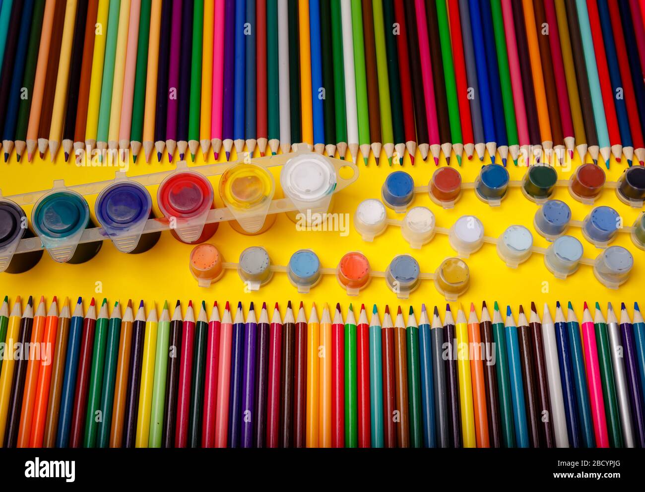 School background. Color pencils and paint on yellow background Stock ...