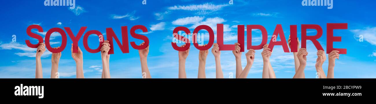 People Hands Holding Word Soyons Solidaire Means Showing Solidarity ...