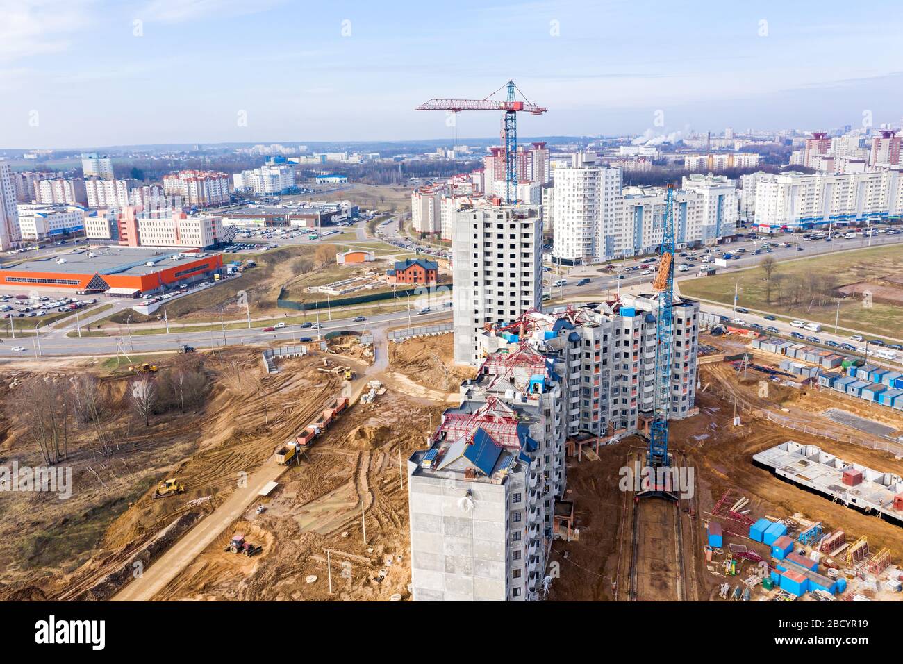 construction of new apartment building in a residential area. aerial ...