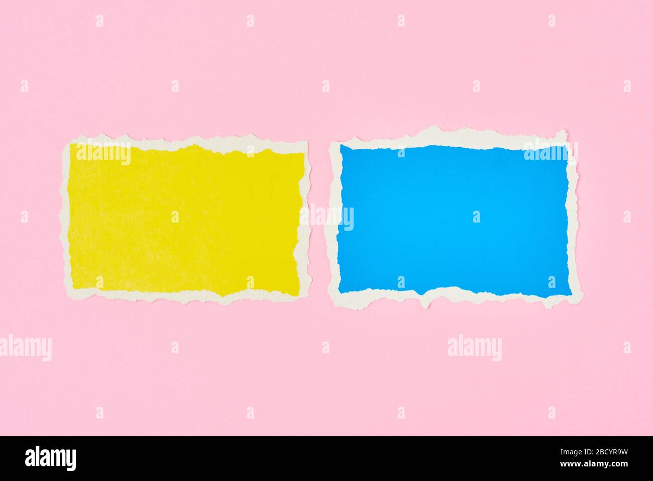 Two ripped paper torn edge sheets on pink background. Template with ...