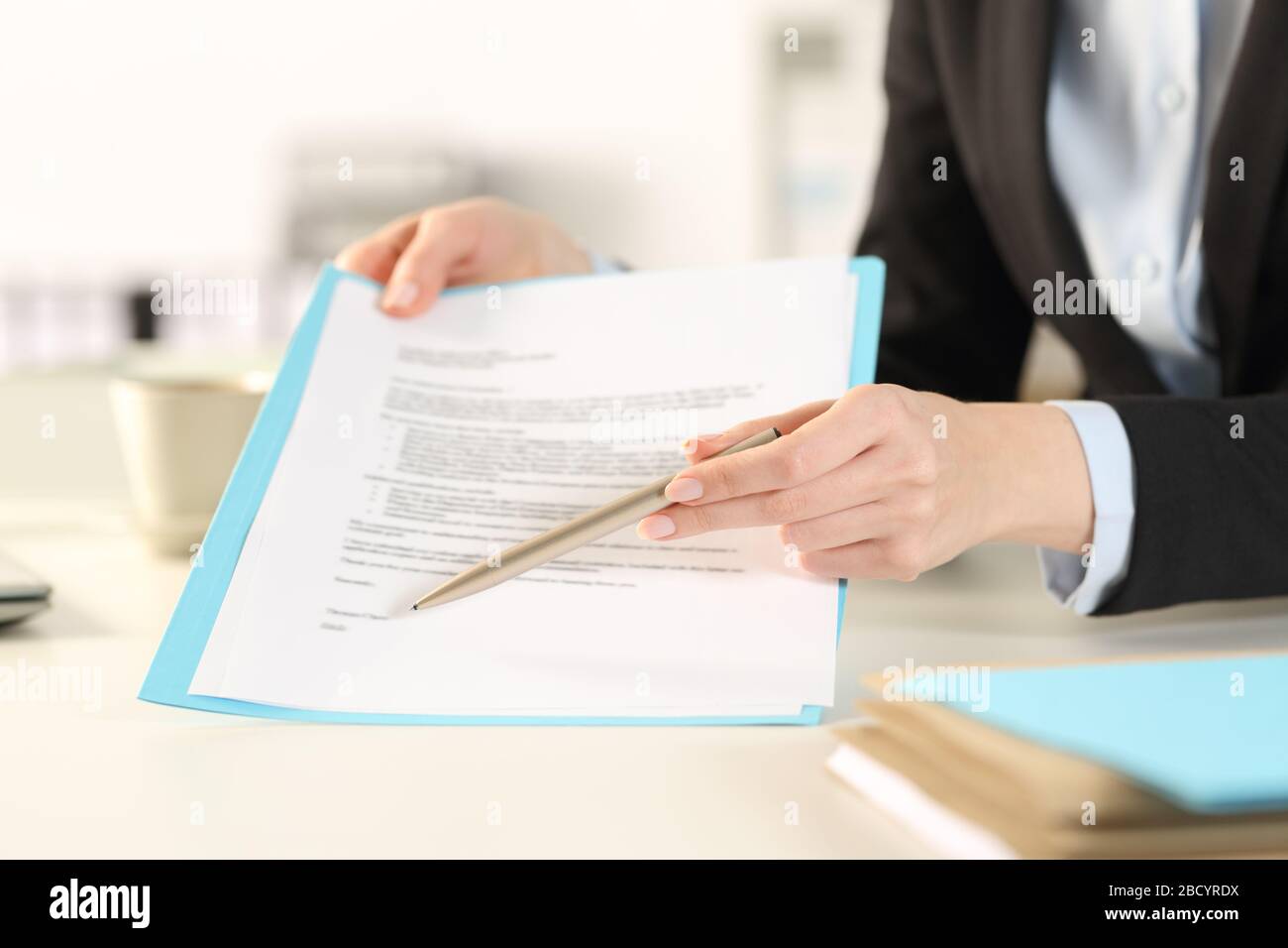 Close up of executive woman hands showing camera contract pointing ...