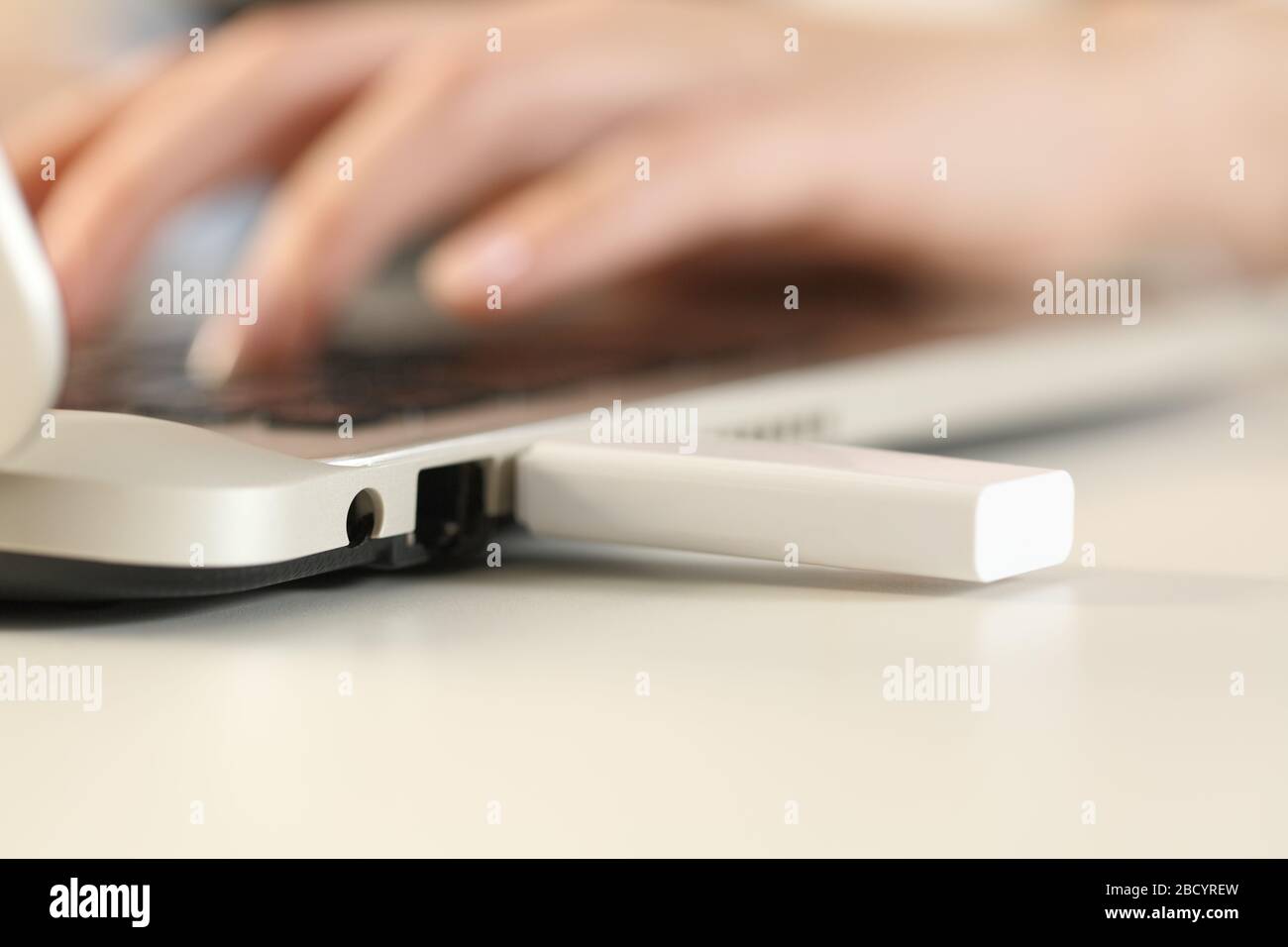 Woman plugging computer hi-res stock photography and images - Alamy
