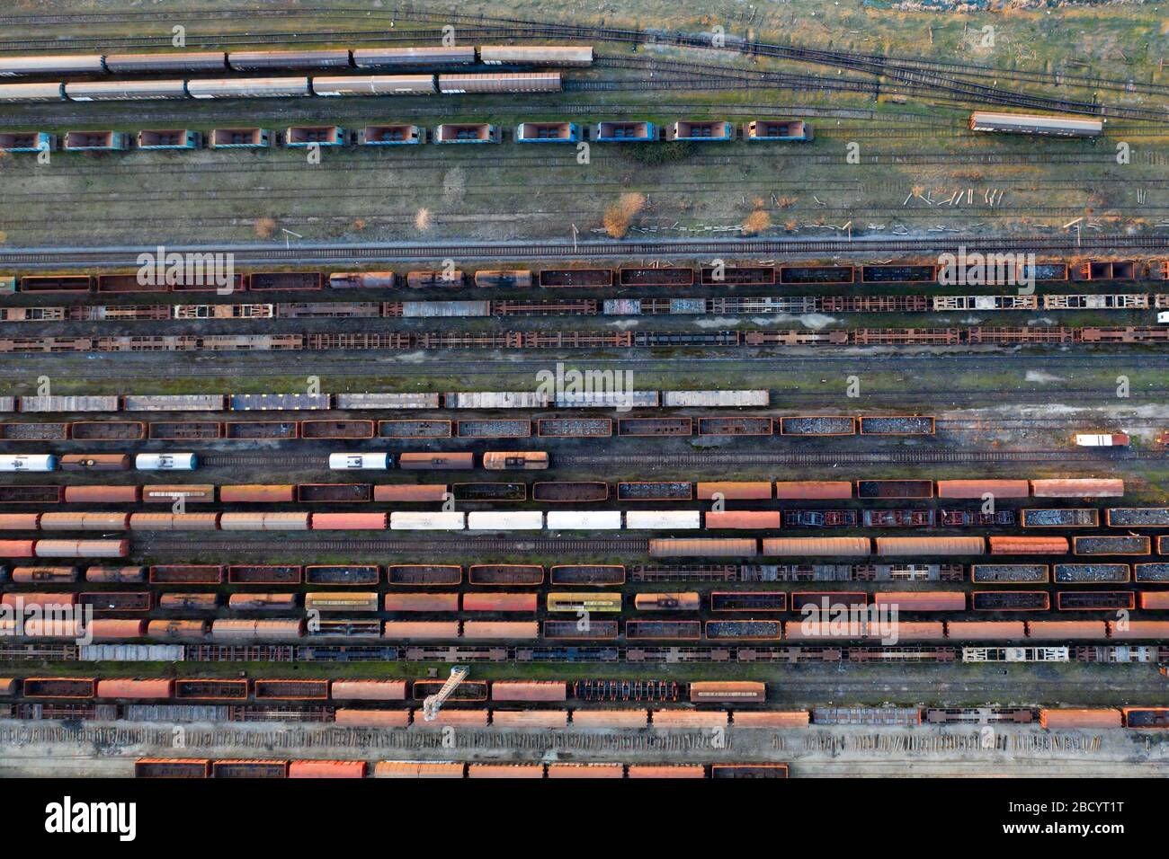 Aerial view of various railway carriage trains with goods on the ...