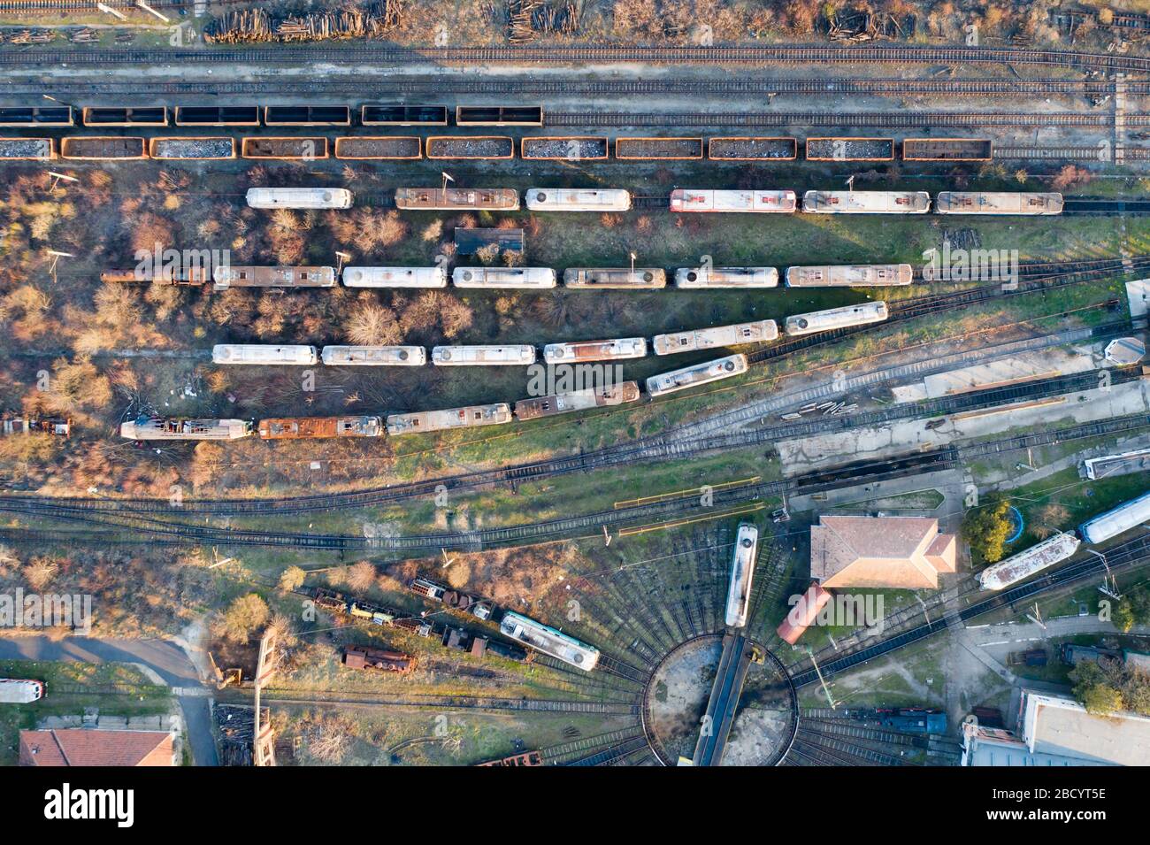 Aerial view of various railway carriage trains with goods on the ...