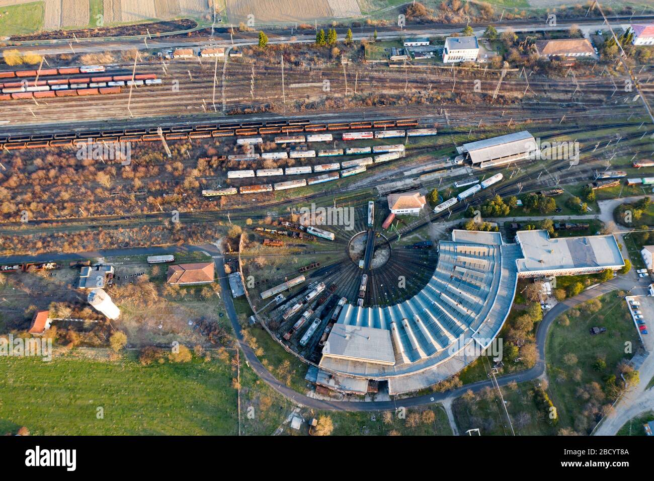Aerial view of various railway carriage trains with goods on the ...
