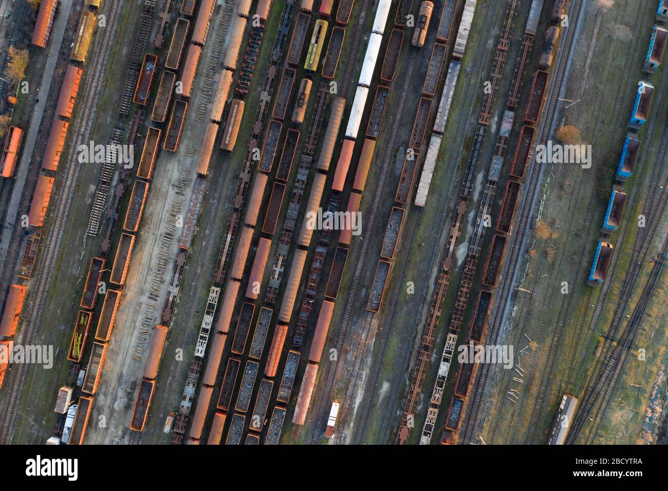 Aerial view of various railway carriage trains with goods on the ...