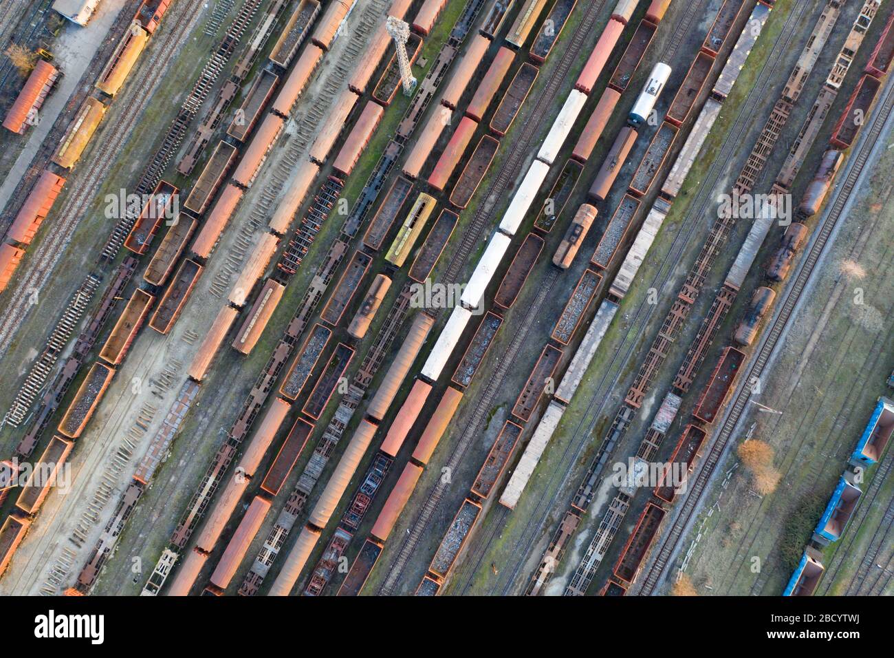 Aerial view of various railway carriage trains with goods on the ...