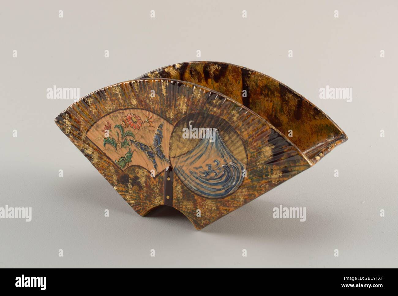 Vase. Research in ProgressA fan shaped vase sitting on two feet. The ...