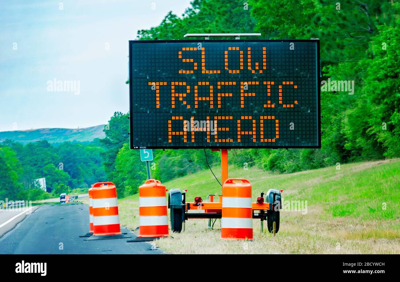 A sign on Interstate 10 East warns motorists of slow traffic ...
