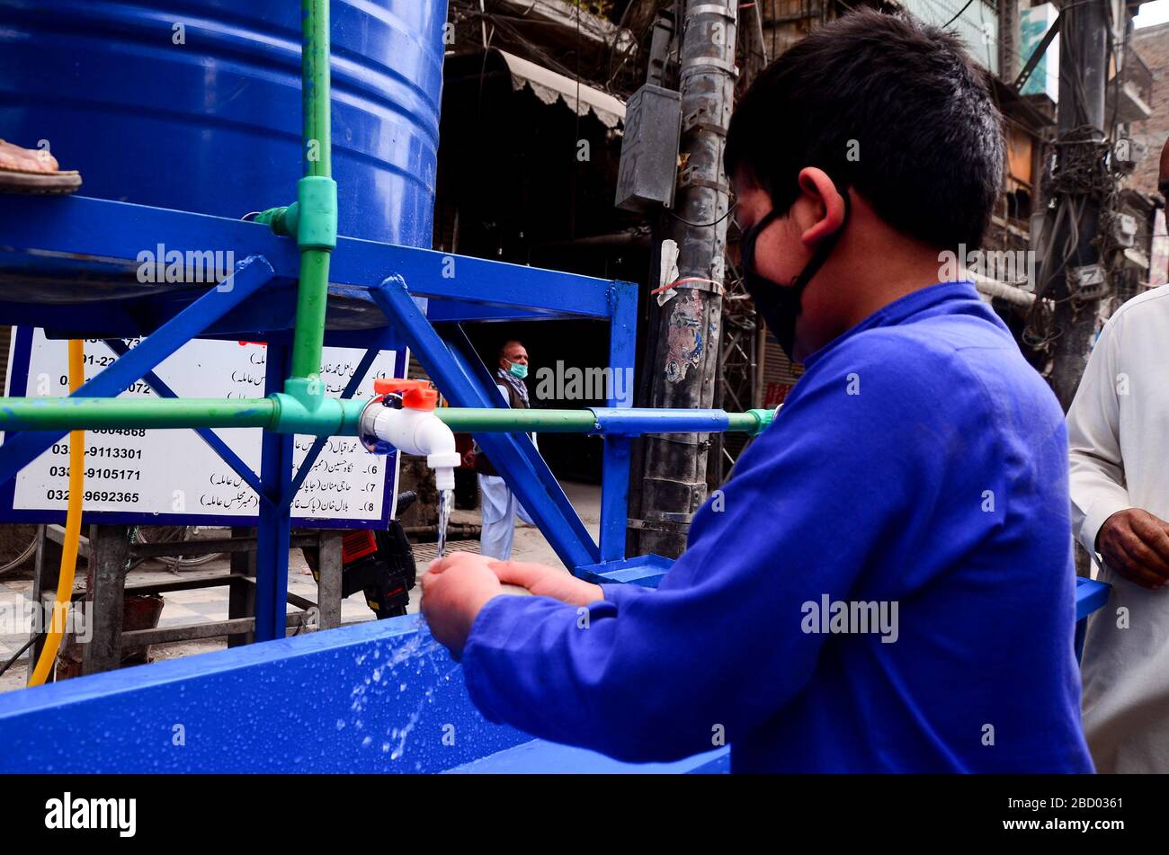 April 5, 2020: Peshawar, Pakistan. 04 April 2020. People wash their ...