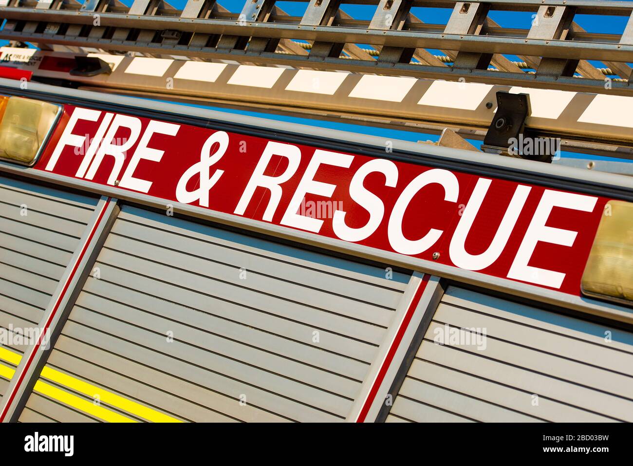 Angled view of FIRE & RESCUE sign on the side of a British ladder and ...