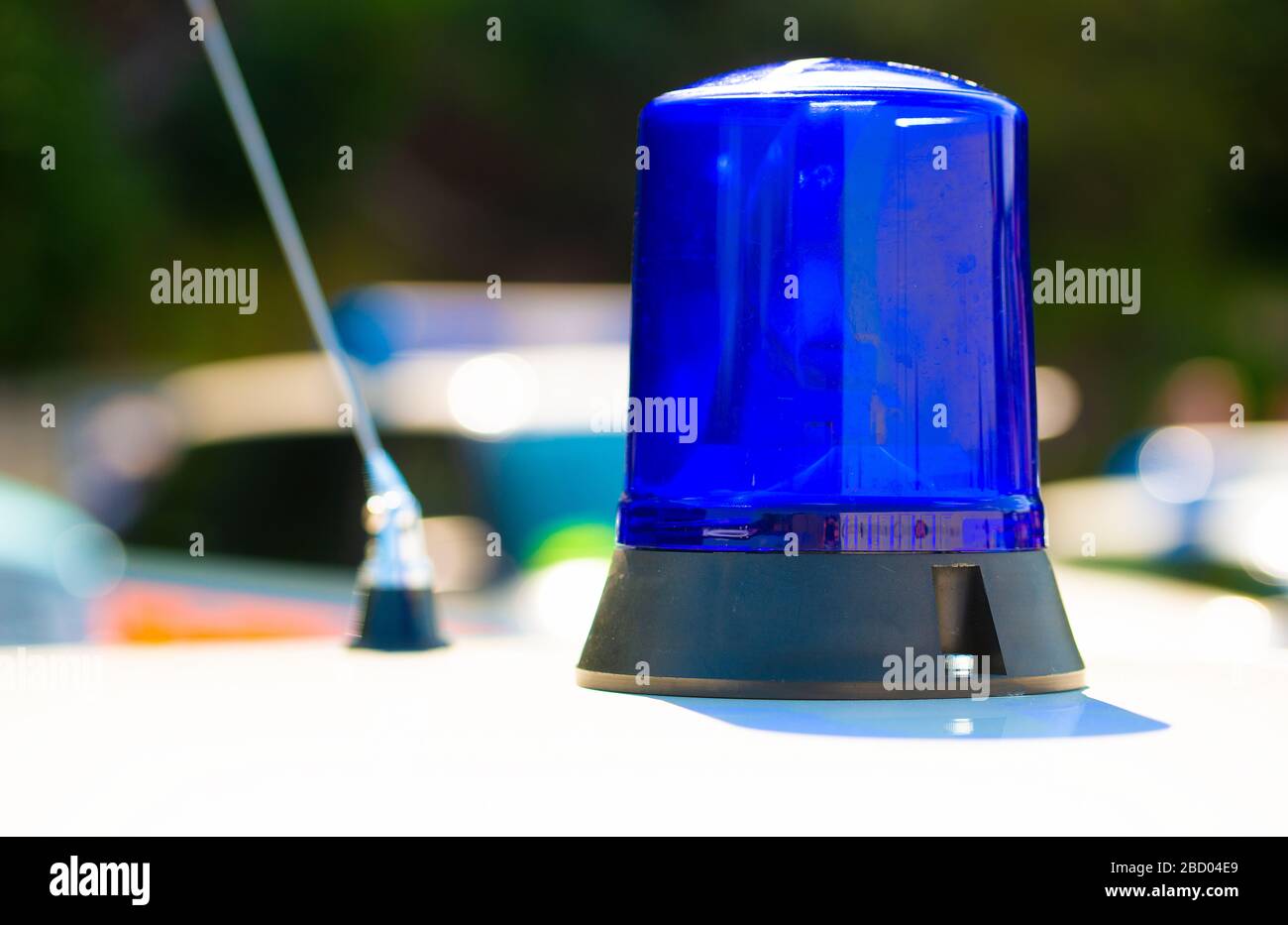 Close up of police blue light atop of an emergency response patrol ...