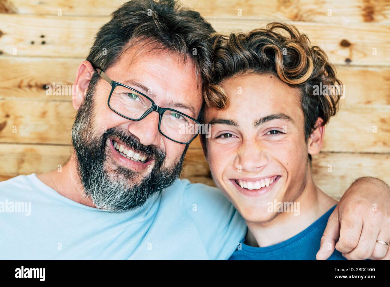 Father hug teen son hi-res stock photography and images - Alamy