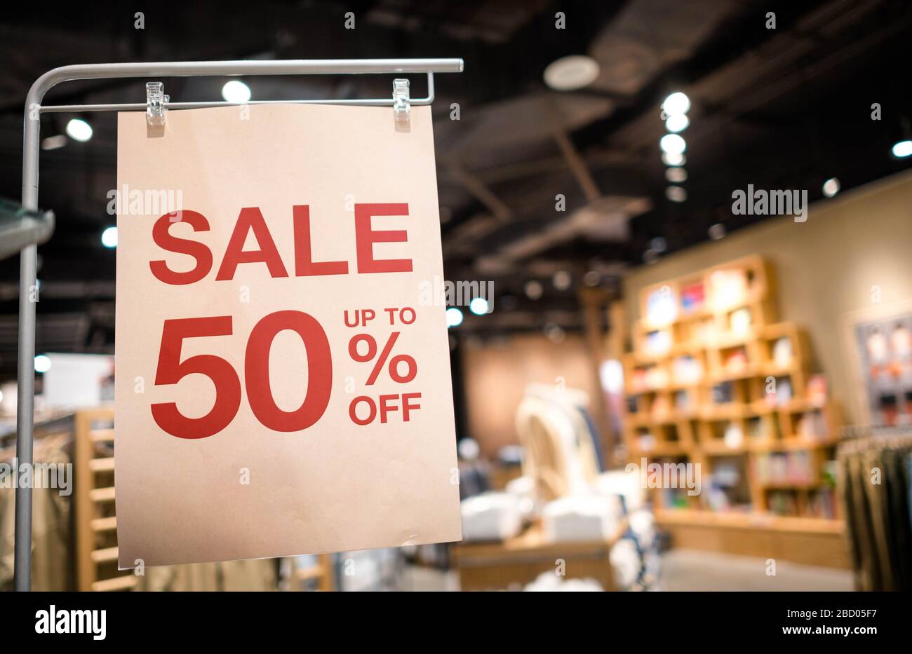 Discount percentage sign display in fashion department store during ...