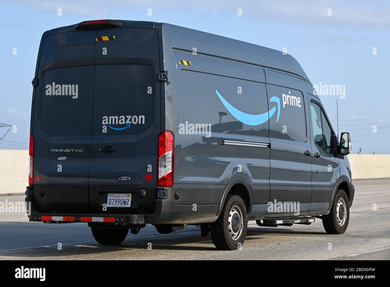 An Amazon Prime, Ford Transit 250, delivery van drives southbound on ...