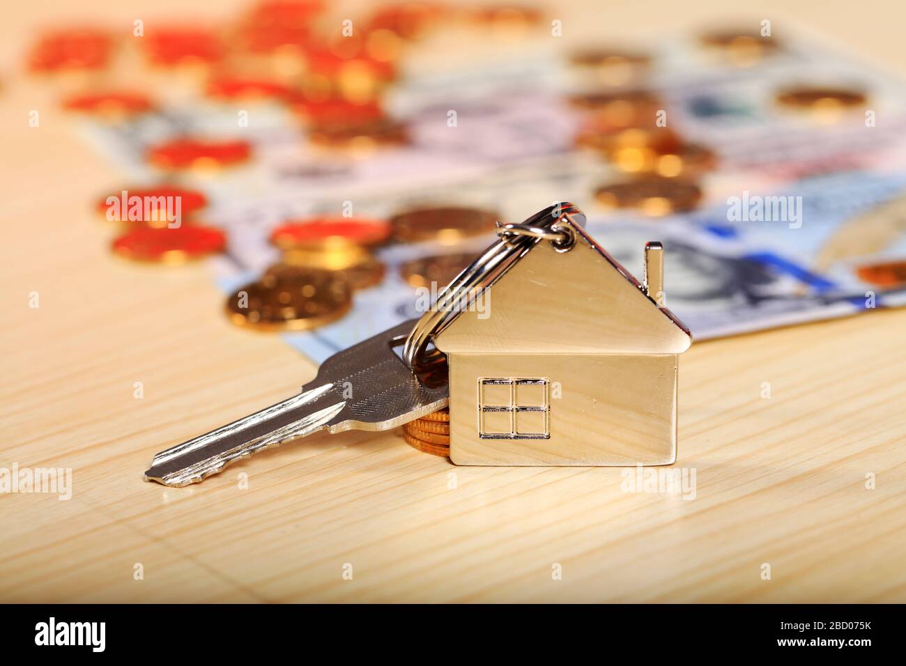 House model, the key and the dollar Stock Photo - Alamy