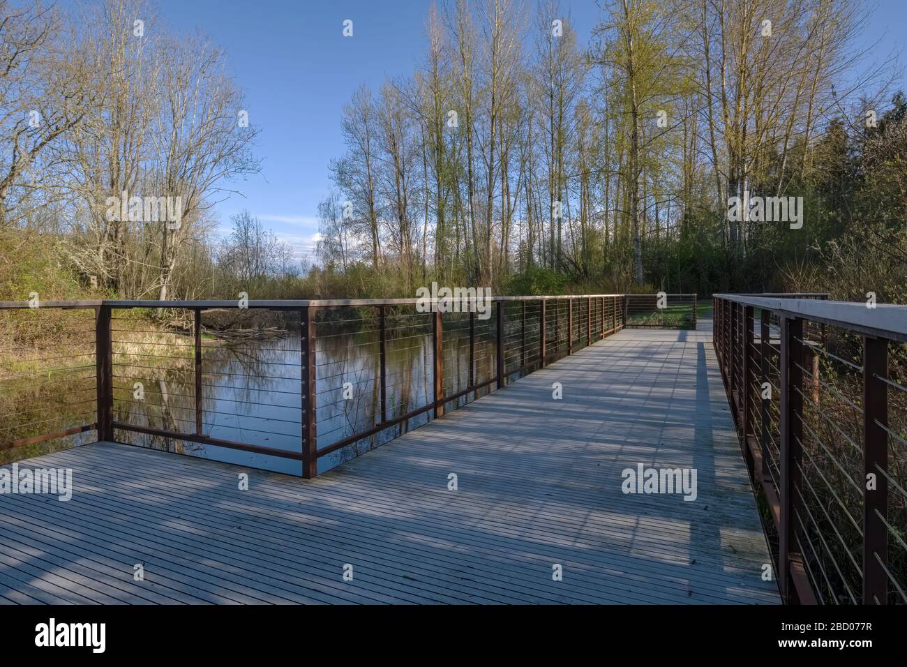 Public park landscape and pedestrian bridge in a park Fairview Oregon ...