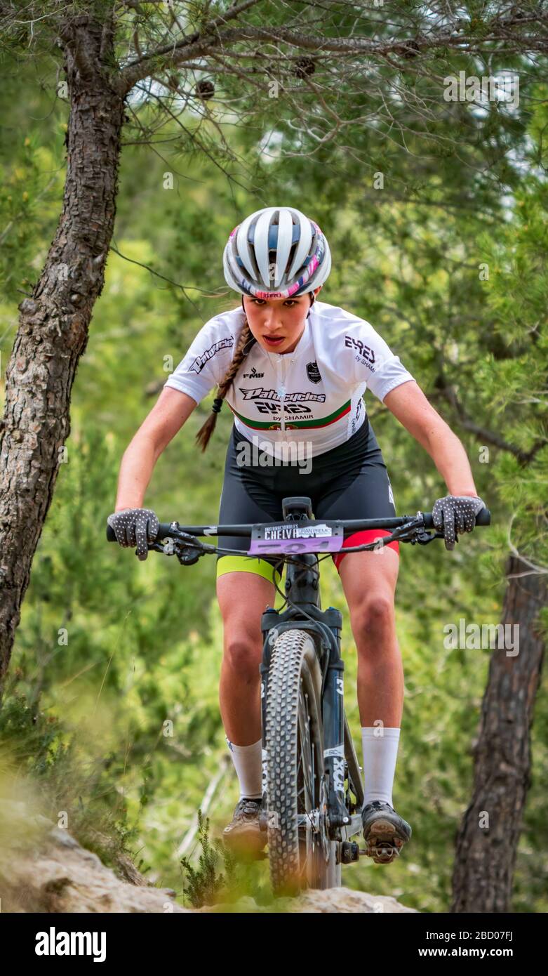 Ana Santos in the pine tree forest during in MTB championship Stock ...