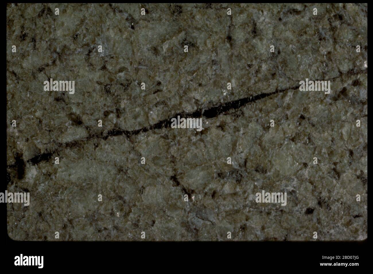Close-up photograph (5:1) of a glass-filled crack in the Zagami ...