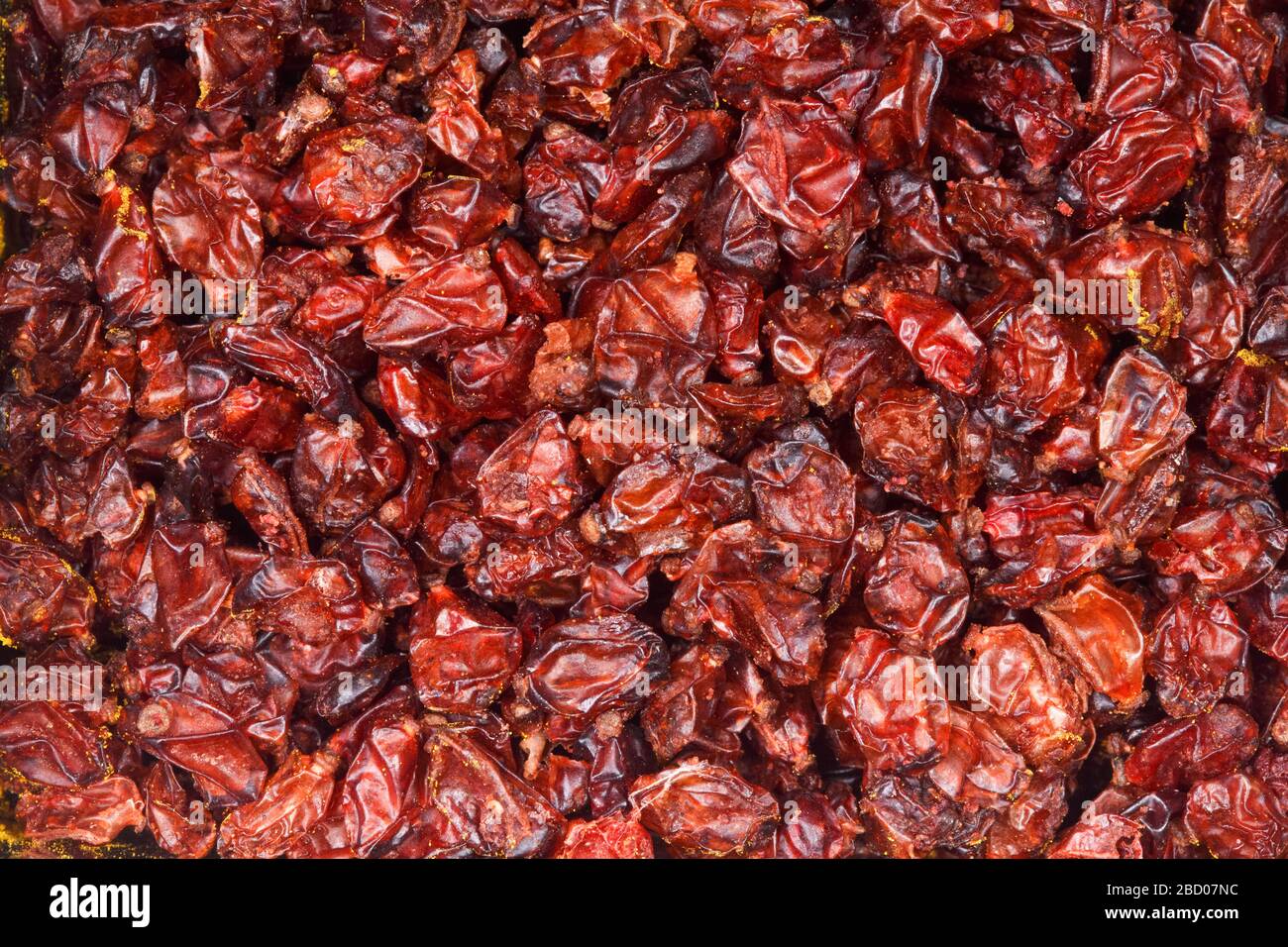 Dried barberry berries close-up in background form. Healthy ingredient ...
