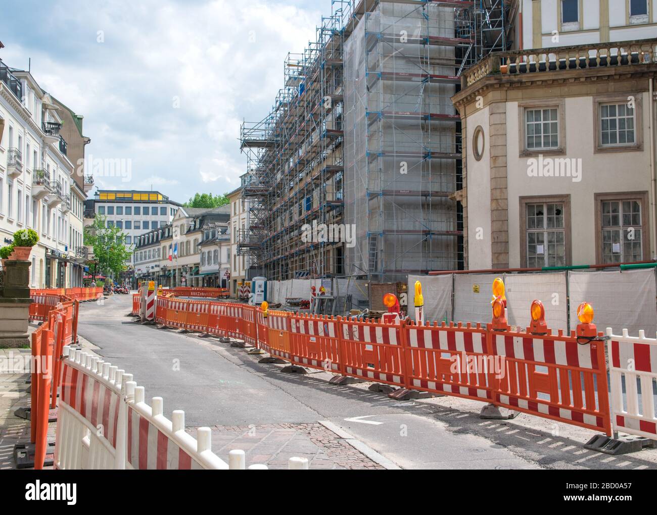Renovation work on the street. Road in a city. Reconstruction equipment ...