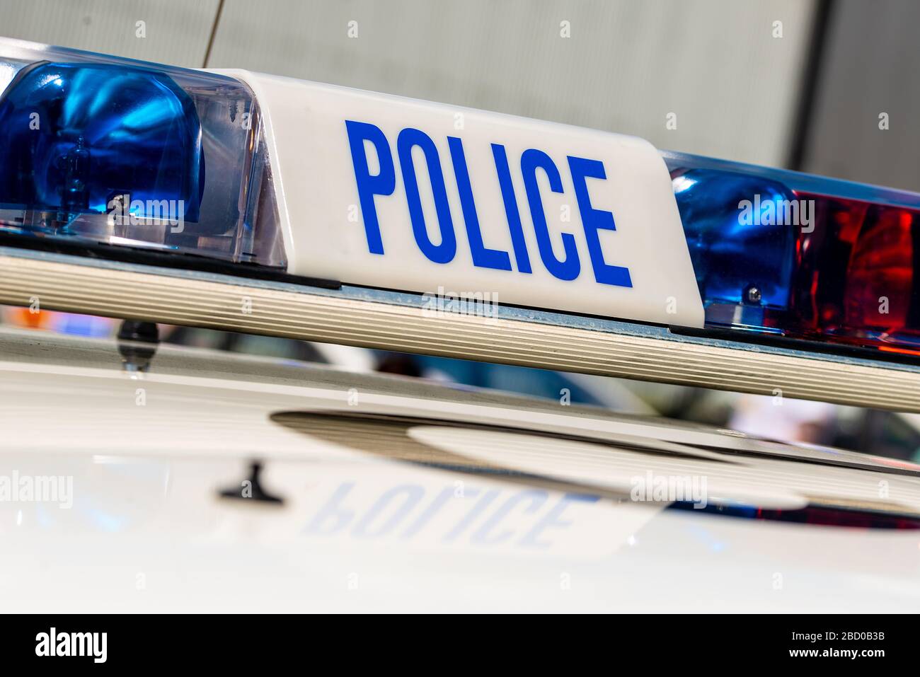 Angled view of POLICE sign with lights, atop an emergency response ...