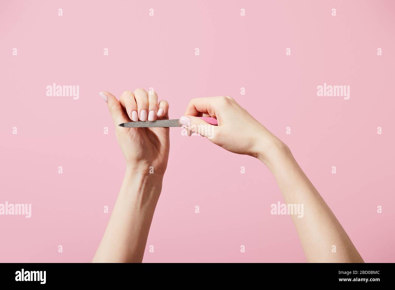 Woman filing nails hi-res stock photography and images - Alamy