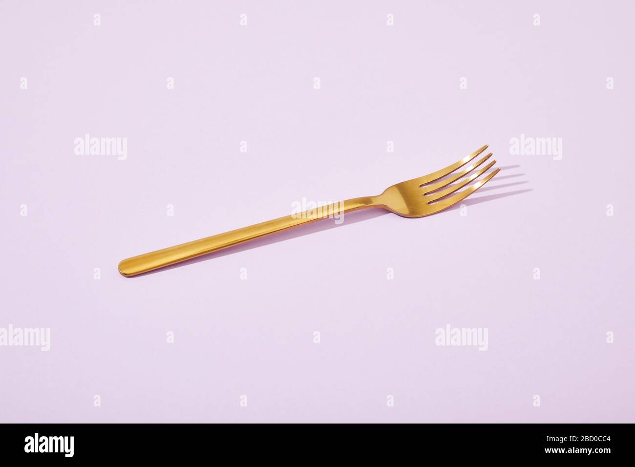 Golden fork hi-res stock photography and images - Alamy